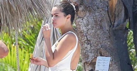 Selena Gomez White One Piece In Mexico Popsugar Fashion