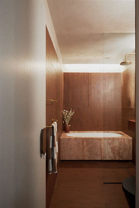 Sonn Uses Rough Plaster Finishes For Sculptural London Extension