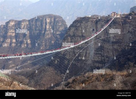 Tourists Throng To Walk On The Worlds Longest Glass Bridge In The