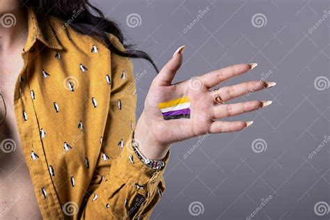 Young Non Binary Woman Showing Non Binary Gender Flag In Hand Close Up Stock Image Image Of Young Non Binary Woman Showing Non Binary Gender Flag In Hand Close Up Stock Image Image Of