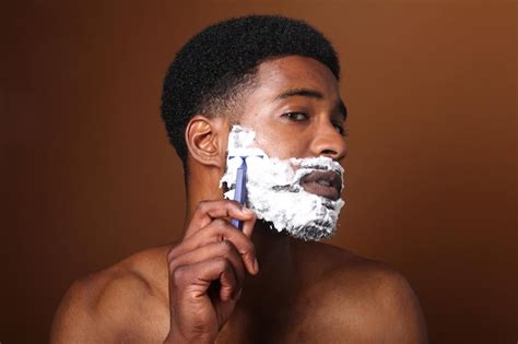 Premium Photo Beautiful Man Shaving