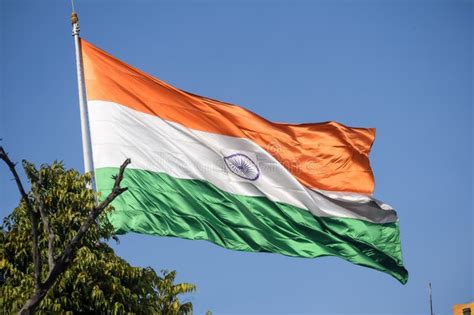 India Flag Flying High At Connaught Place With Pride In Blue Sky India