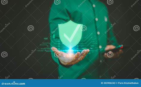 User Hand Show The Shield Security Icon For Security Protection System On Virtual Screen