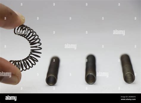 Compressed Spring Coil