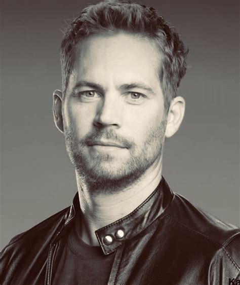 A Black And White Photo Of A Man In A Leather Jacket