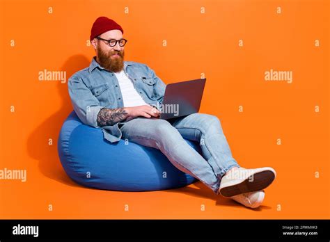 Full Body Photo Of Geek Nerd Guy Working On Laptop Online Shopping Sit