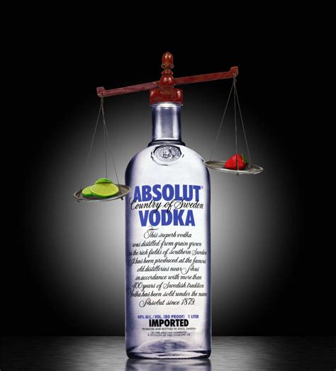 Download Absolut Vodka Bottle In Dark Room Wallpaper