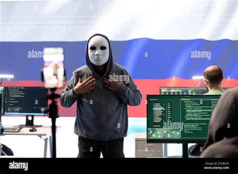 Anonymous Hacker Expert In A Russian Hacking High Tech Office Digital Threats And Political