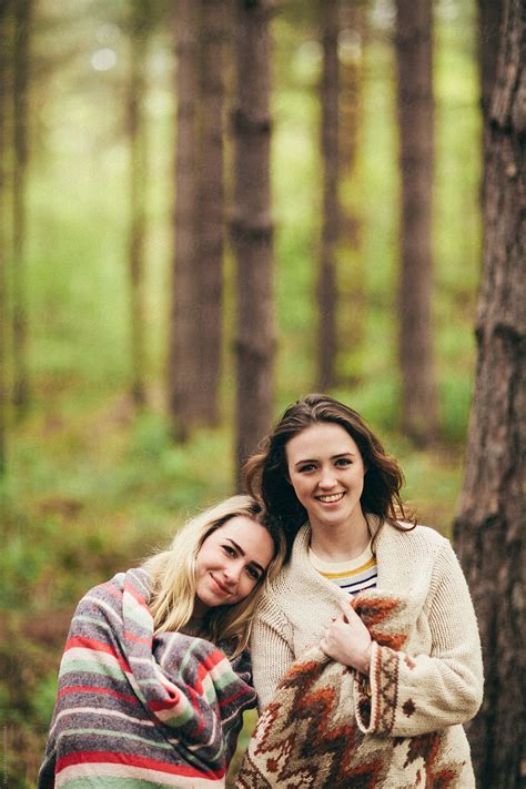 Two Teenage Girls Camping In Woodland By Stocksy Contributor Kkgas