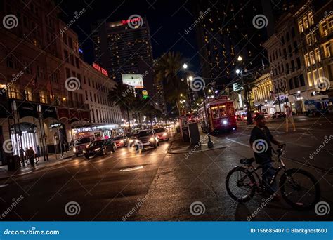 Bicycle Traffic And A Streetcar On Canal Street In New Orleans