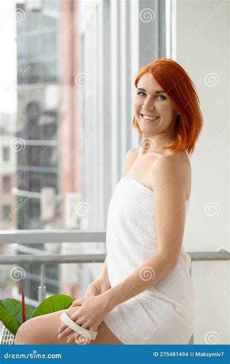Cellulite Treatment Woman Arm Holding Dry Brush To Of Her Leg Stock