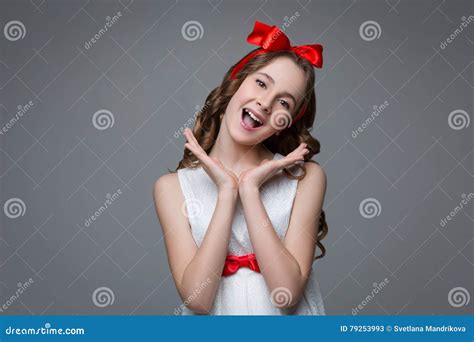 Surprised Teen Girl With Red Bow On Head Stock Image Image Of