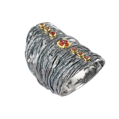 Oxidised Silver And Ruby Textured Shield Ring Tomfoolery London