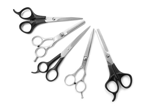 Premium Photo Five Professional Scissors With Black And Metal Handles