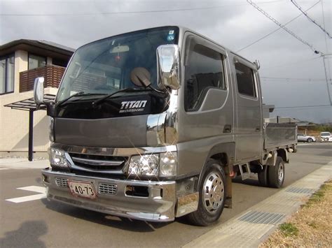 【走行距離 228000 Km】豪華装備タイタンダッシュダブルキャブt低燃費ディーゼルターボメッキ仕様4ナンバーnoxpm適合