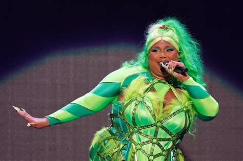 Lizzo Shows Off Curves In Tiny String Bikini As She Blasts Body Shamers In Defiant Post Mirror