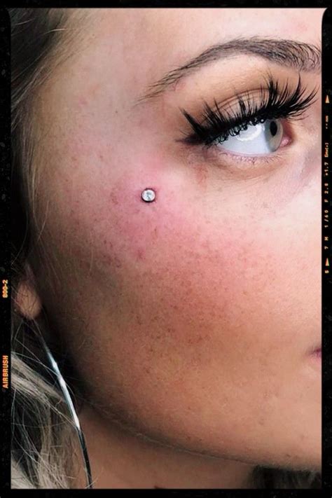 Microdermal Piercing Face Scar