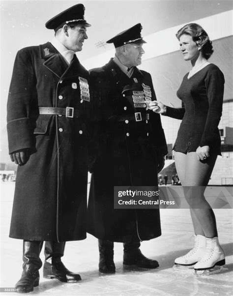 Dutch Skater Sjoukje Dijkstra Talks To Two Policemen During A Break