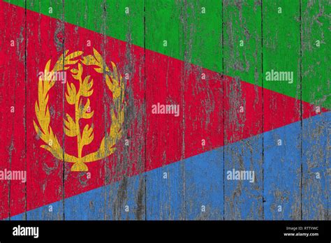 Flag Of Eritrea Painted On Worn Out Wooden Texture Background Stock Photo Alamy