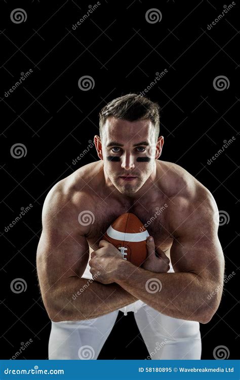 Shirtless American Football Player Holding A Ball Royalty Free Stock Image CartoonDealer