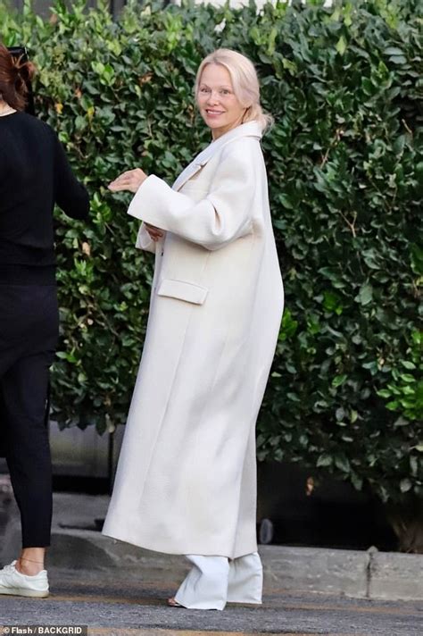 Pamela Anderson Looks Gorgeous In All White As She Arrives At Cookbook
