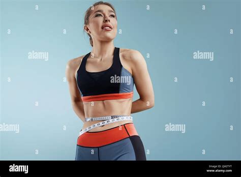 Fit Fitness Girl Measuring Her Waistline With Measure Tape Weight Loss