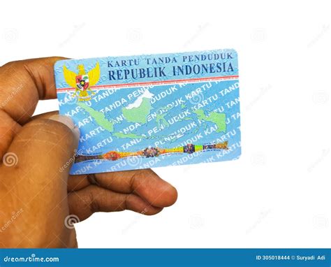 Hand Holding Indonesian Identity Card Or KTP On Isolated Background