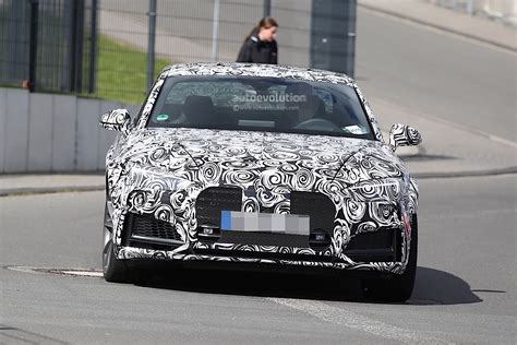 Audi RS5 Mule Spied Testing Wears Full Camouflage And Wide Wheel
