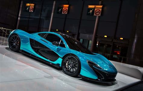 Sleek Blue Mclaren P1 Aerodynamic Supercar Wallpaper Background Free