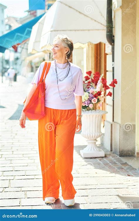 Outdoor Portrait Of Happy And Healthy Mature 50 55 Year Old Woman