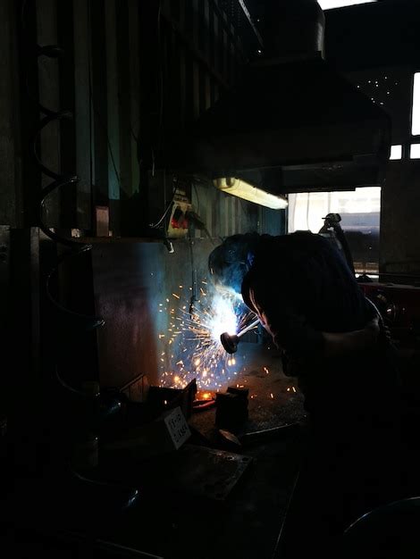 Premium Photo Man Working At Workshop