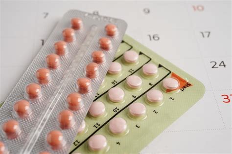 Premium Photo Pregnancy Test For Female On Calendar Ovulation Day