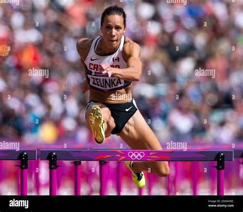 Canadas Jessica Zelinka Competes During The 100 Meter Hurdles Portion