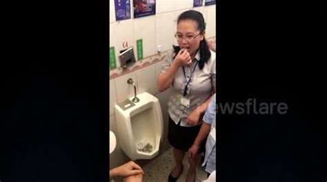 Chinese Employee Devours Food From Urinal To Prove How Clean It Is