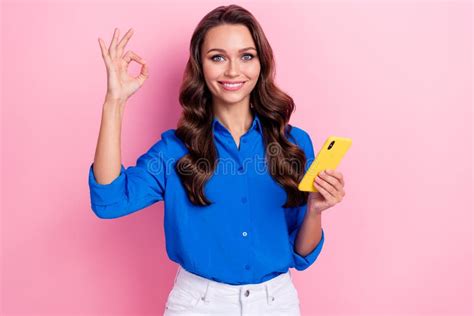 Photo Of Positive Satisfied Gorgeous Woman Curly Hairdo Dressed Blue