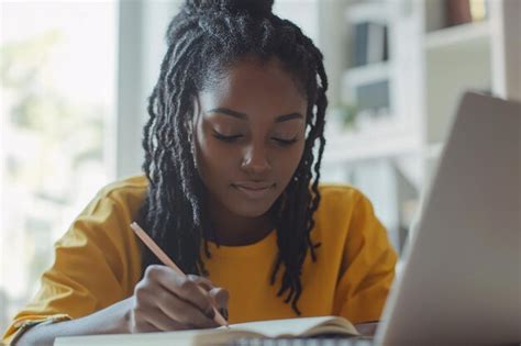A Girl Writing On A Notebook With A Pen In Her Hand Premium Ai