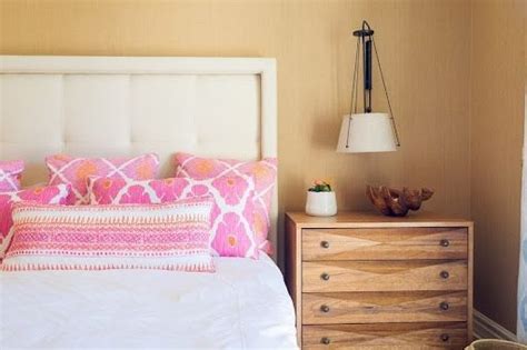 Pink And Orange Pillows For A Cozy Bedroom