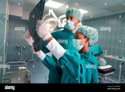 Healthcare And Medical Concept Group Of Doctors Looking At X Ray