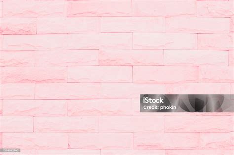 장식 벽돌 사암 벽 표면의 원활한 핑크 파스텔 패턴 현대 스타일의 디자인 장식 고르지 의 콘크리트는 여러 가지 빛깔의 돌 또는
