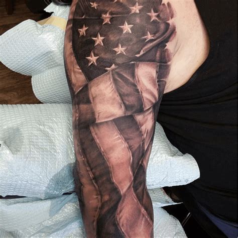 Black And White American Flag Sleeve Tattoo