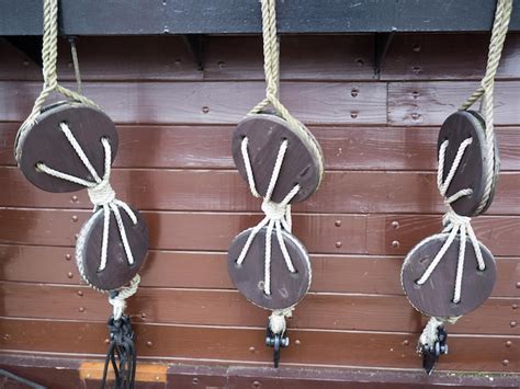 Premium Photo Close Up Of Ropes Tied On Rope