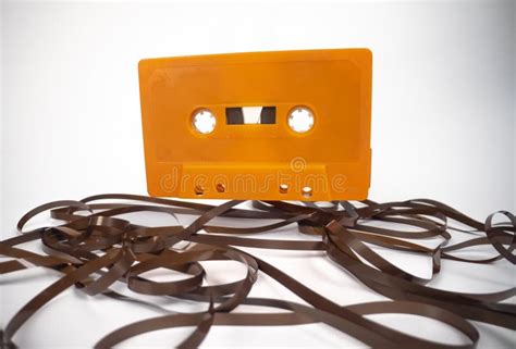 An Orange Cassette With Magnetic Tape On Floor Stock Image Image Of