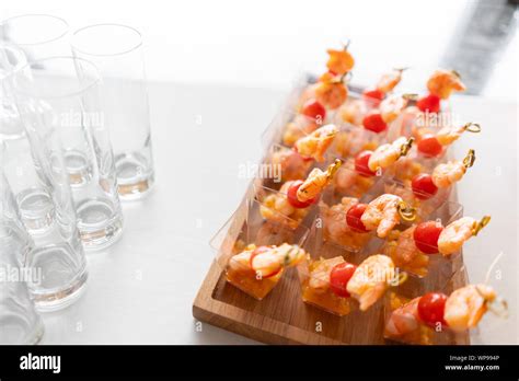 Delicious Shrimp And Sliced Tomatoes Tasty Buffet Table Catering