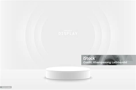 흰색 3d 실린더 연단 받침대 또는 제품 진열대와 원 모양 레이어 뒤에 빛나는 빛이 있는 부드럽고 깨끗한 3d 객실입니다 모형 또는 제품 프레젠테이션을 위한 장면입니다