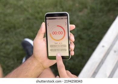 Man Using Fitness App On Smartphone Stock Photo Shutterstock