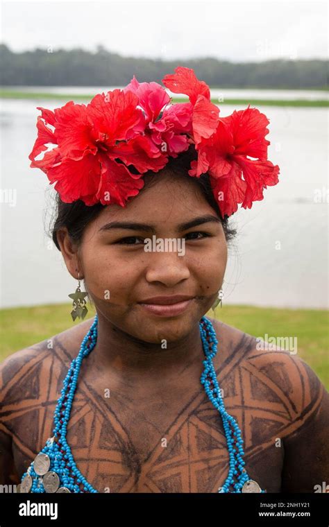 An Indigenous Embera Woman Dressed Up For Visitors In Her Village On Lake Alejuela In Panama