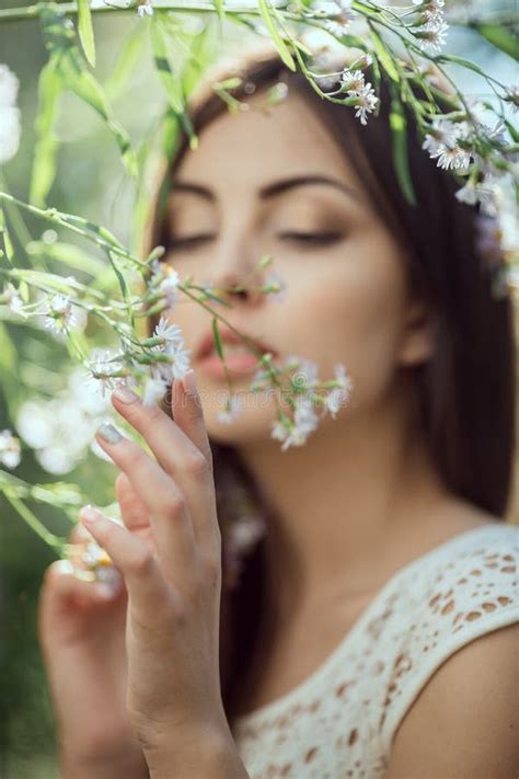 Wild Flowers Beautiful Young Woman Portrait In Flower Field Stock