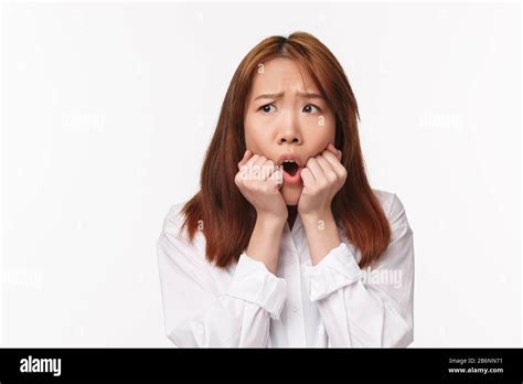 Close Up Portrait Of Asian Girl In Panic Look Afraid And Concerned