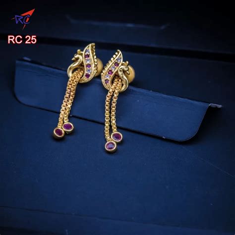 Gold Finish Peacock Design Stud Rc Akshaya