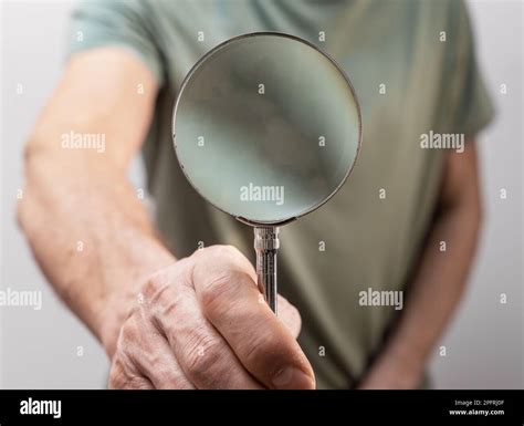 Hand Holding Magnifying Glass Loupe Magnifier Search Information